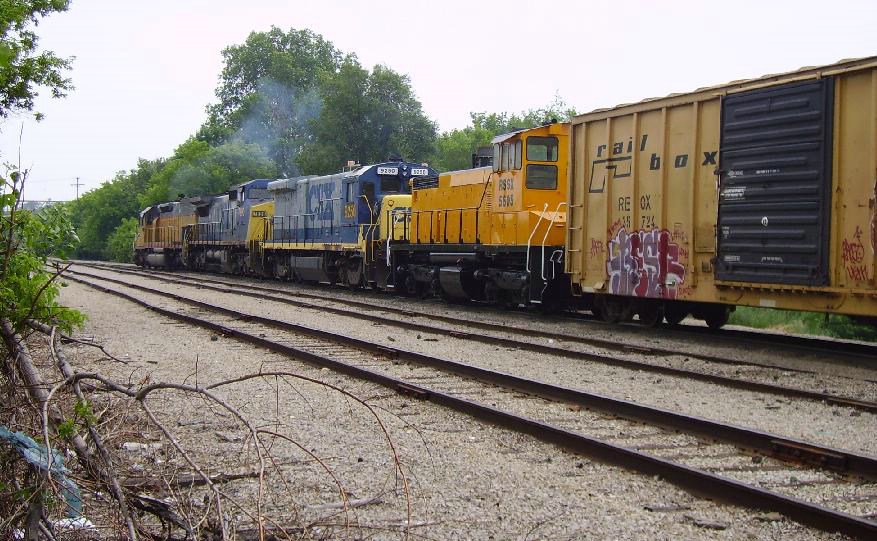 UP 8711 pulling east at Norman Street